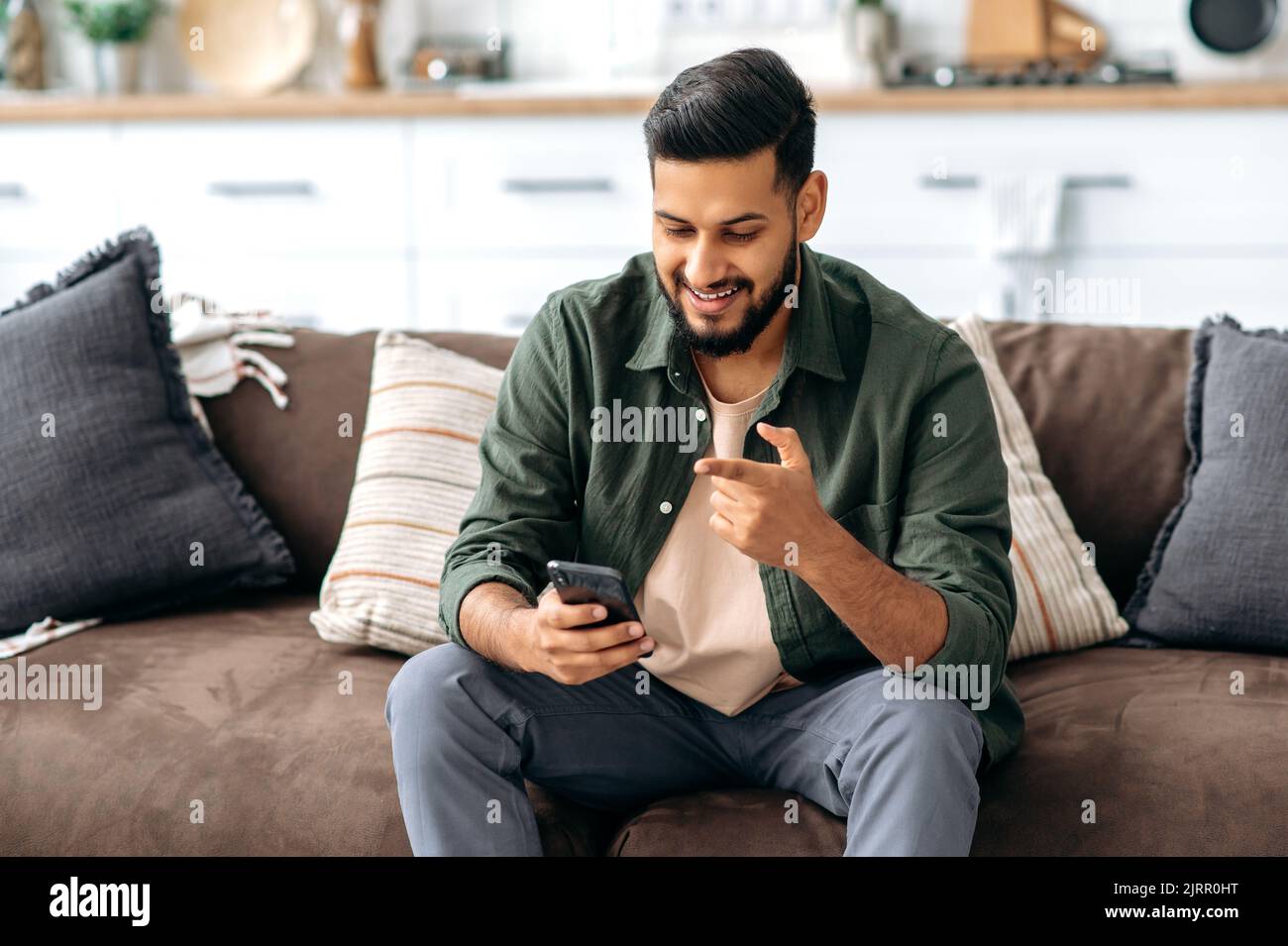 Portrait happy guy typing social hi-res stock photography and images ...