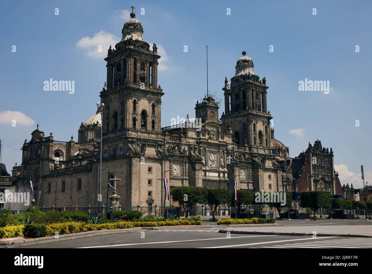 The exterior design of El Zocalo building against the cloudy blue sky ...