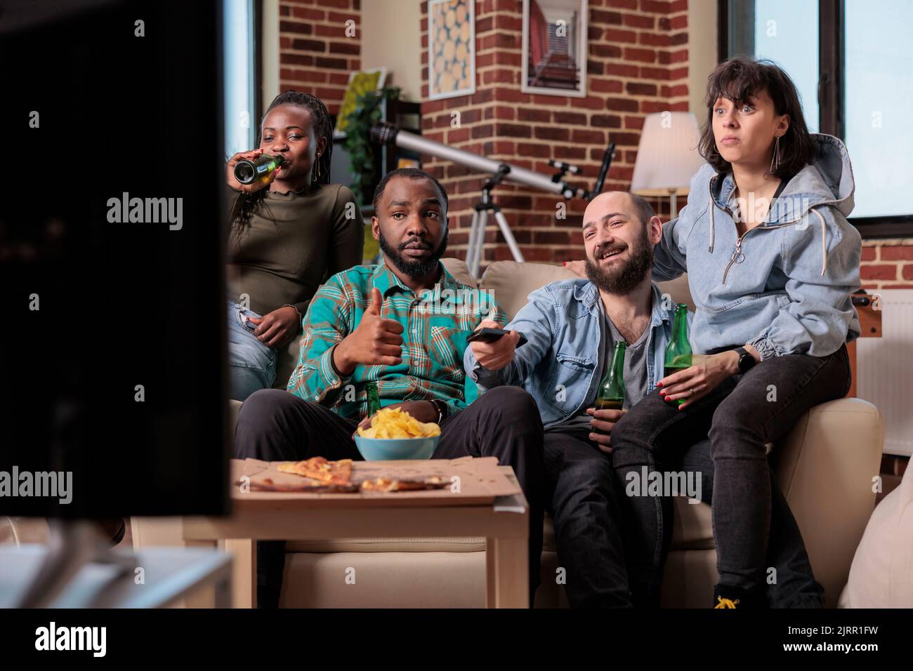 Cheerful people watching tv show or movie on television, gathering ...