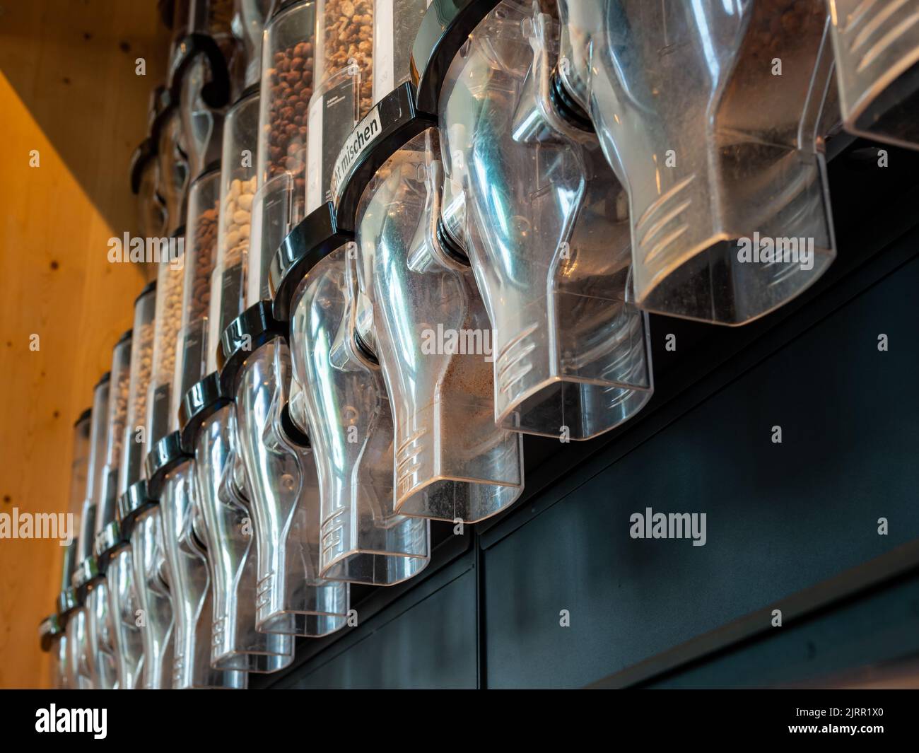Nuts in a vegan supermarket. Unpacked food for filling in reusable ...