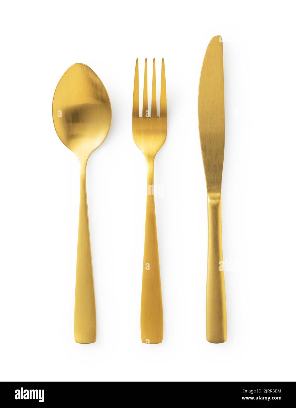 Gold knives, forks and spoons placed on a white background. Beautiful ...