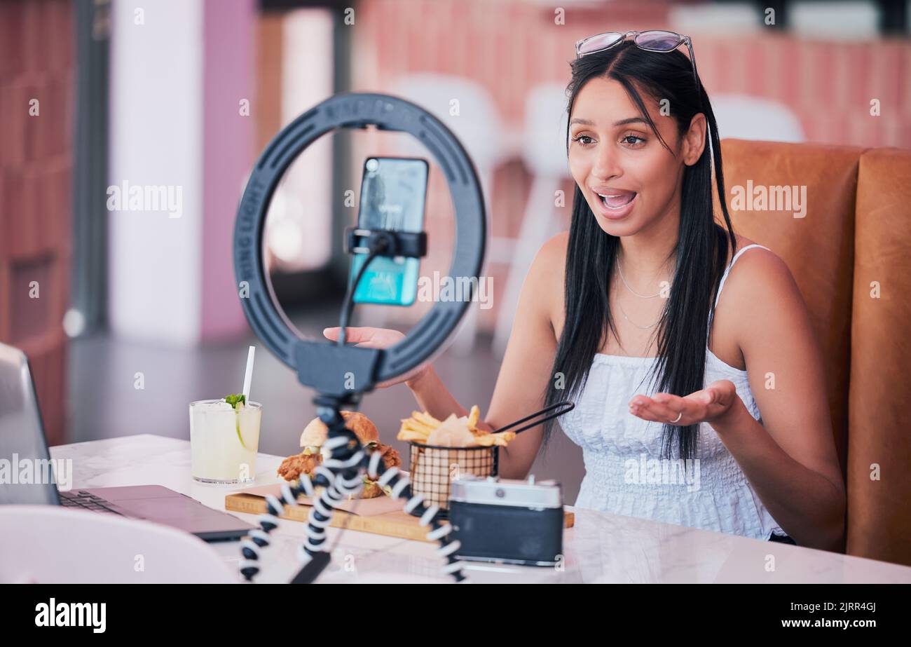 Woman filming food vlog smartphone hi-res stock photography and images ...