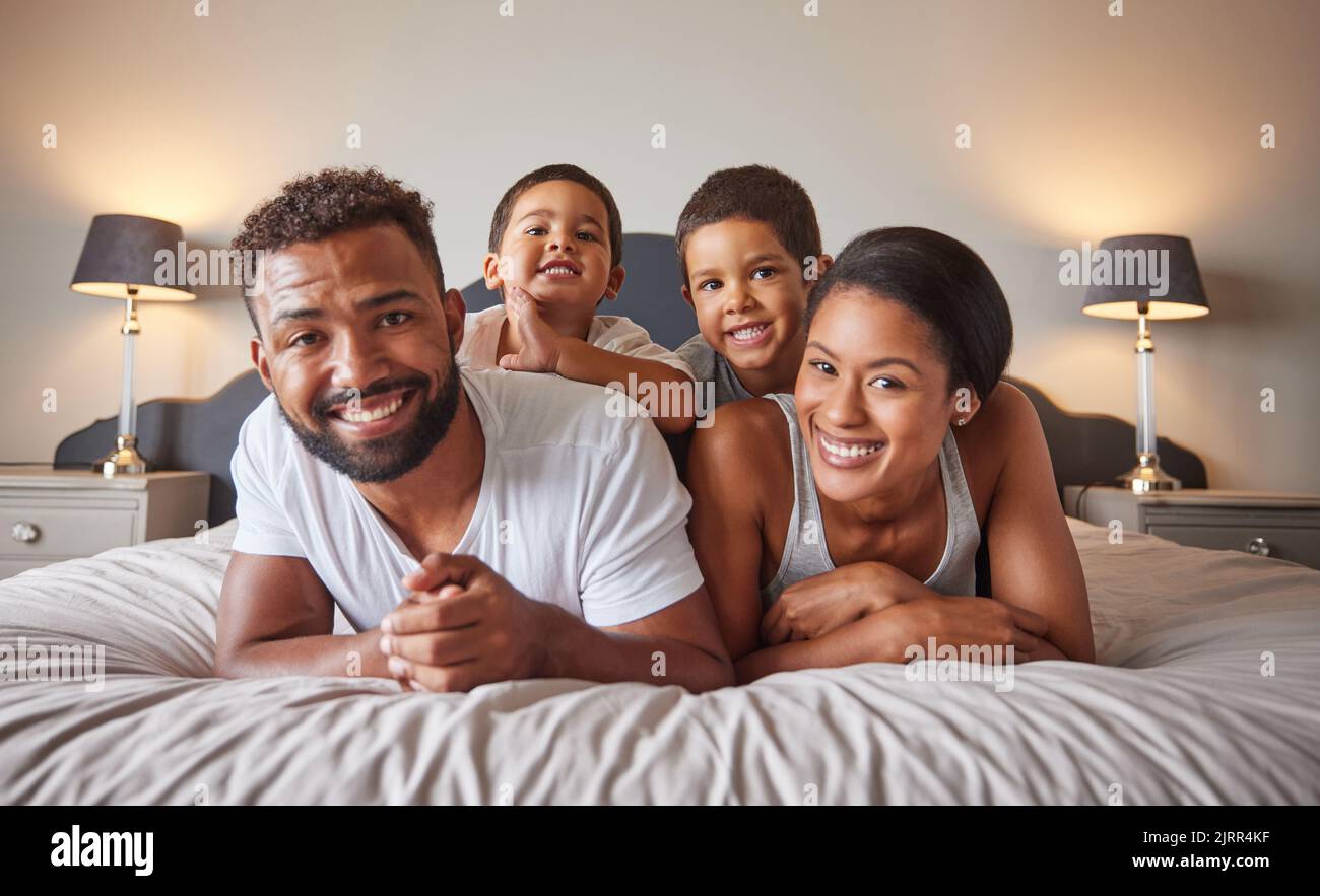 Family on the bed hi-res stock photography and images - Alamy