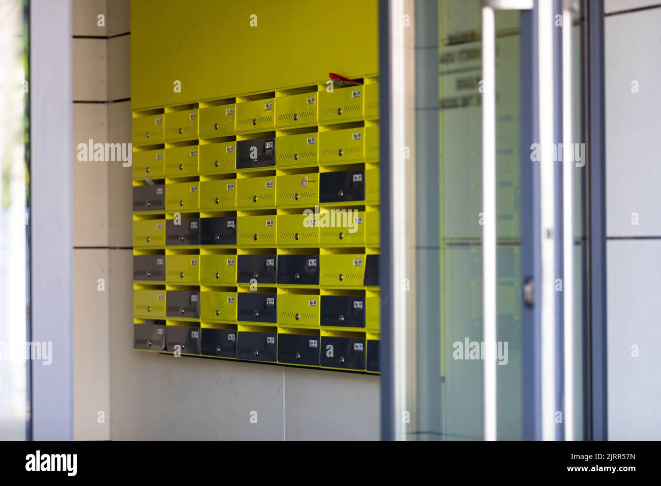 Mailbox in the entrance hall of an apartment building Stock Photo - Alamy