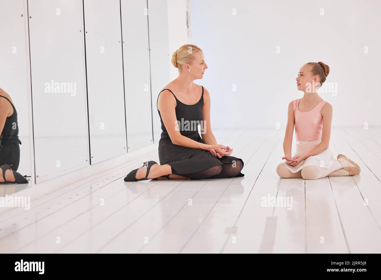 Ballet education school teacher talking to learning student at ...