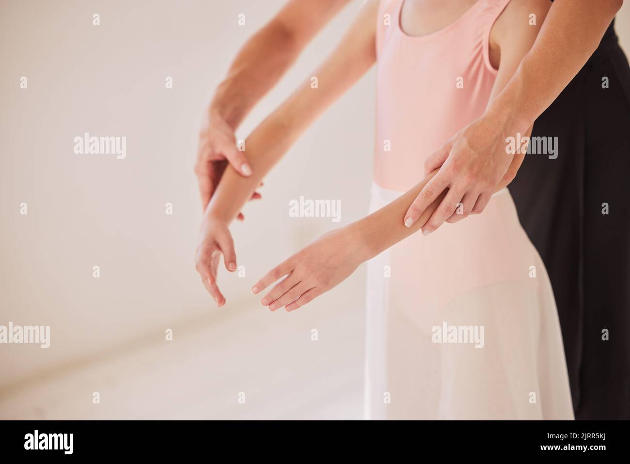 Dance, art and ballet teacher with girl ballerina practicing posture in ...