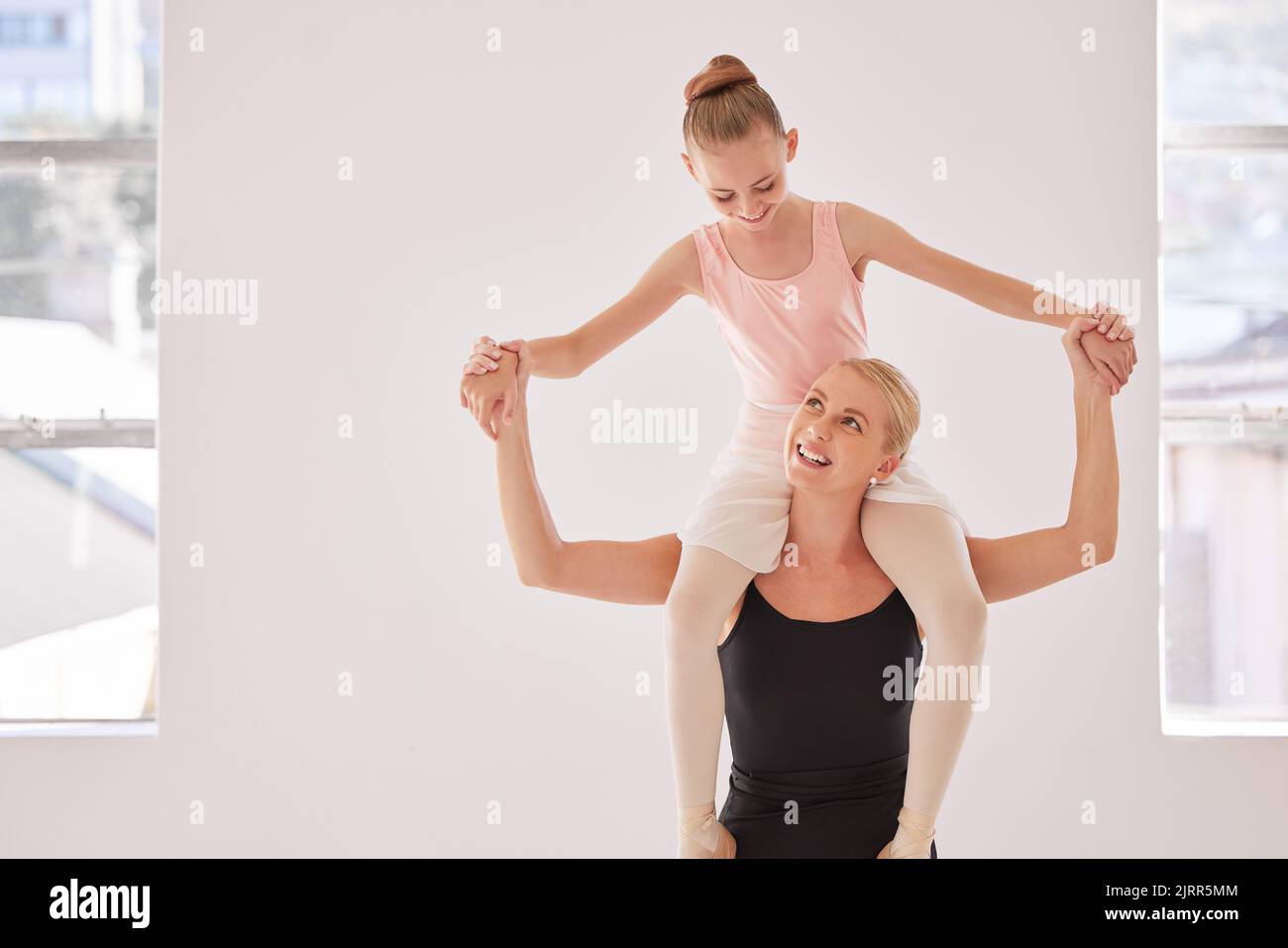 Learning, development and ballet teacher with her student, having fun ...