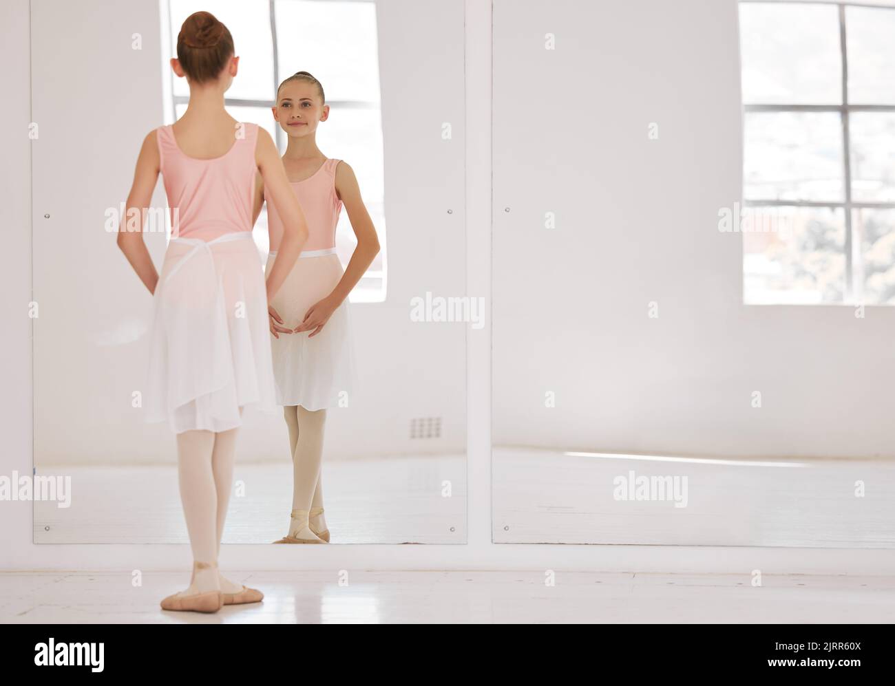 Young ballet dancer dancing in studio, doing dance performance before ...