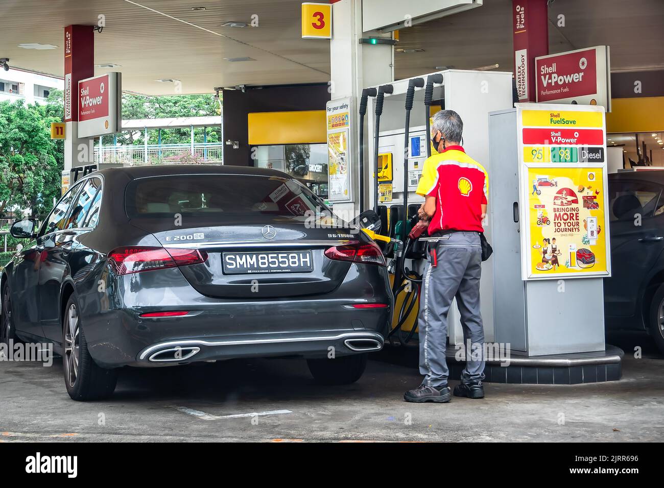Car Refueling at gas or petrol station Stock Photo - Alamy