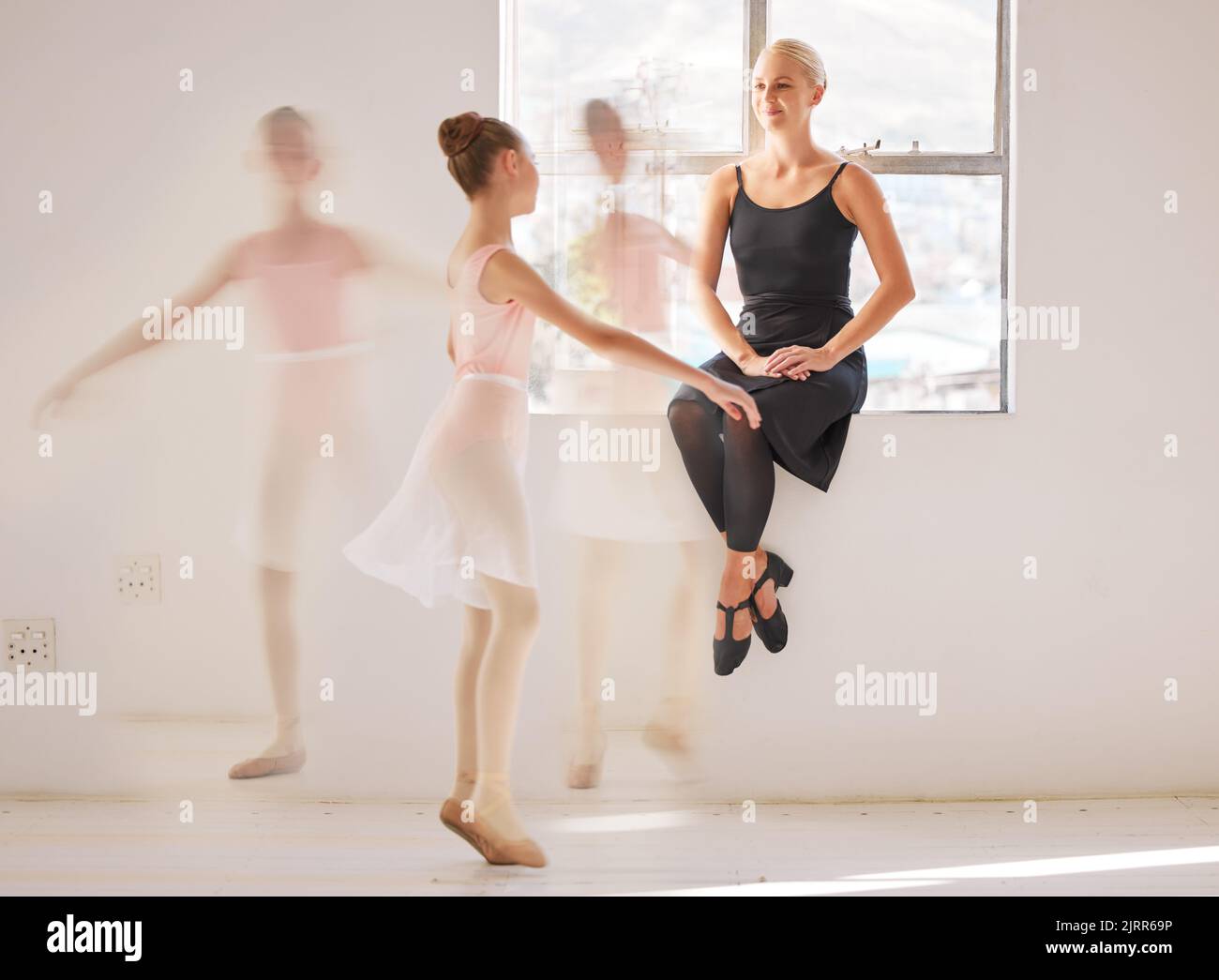 Ballet, student and teacher in dance studio training and motivation ...