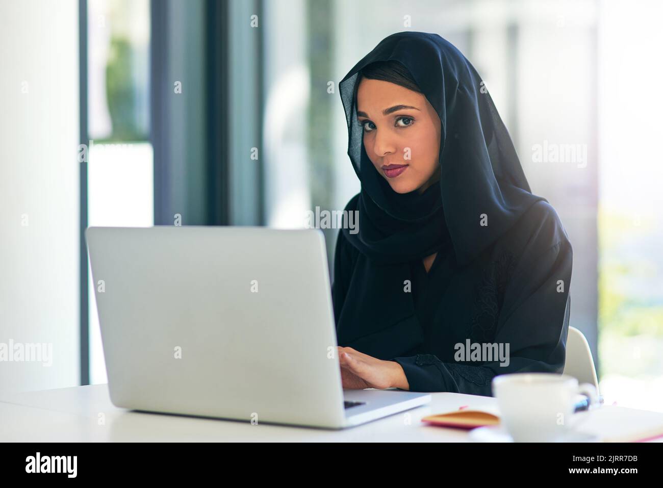 All set for productivity. Portrait of a young muslim businesswoman ...