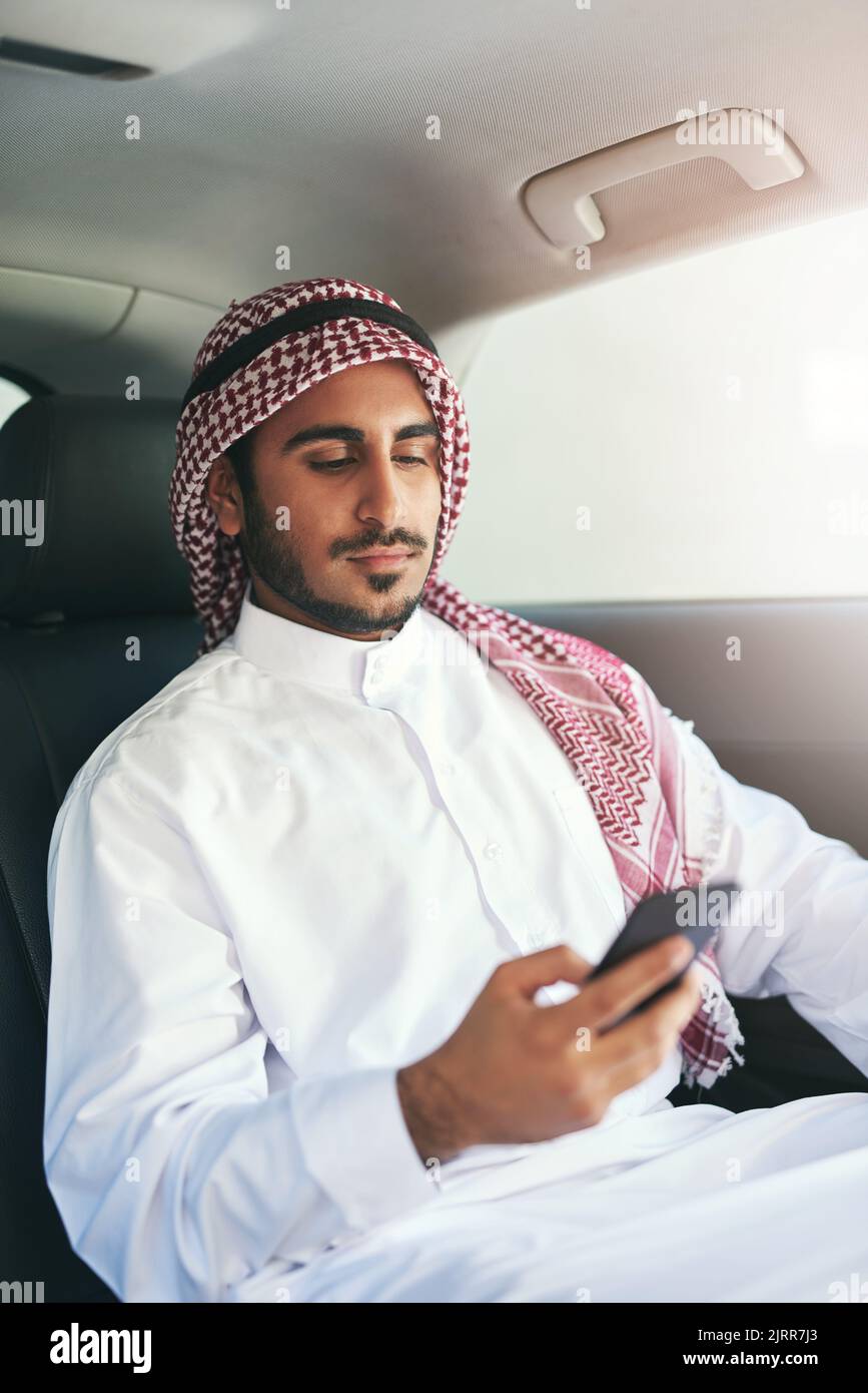 Keeping the lines of communication open. a young muslim businessman ...