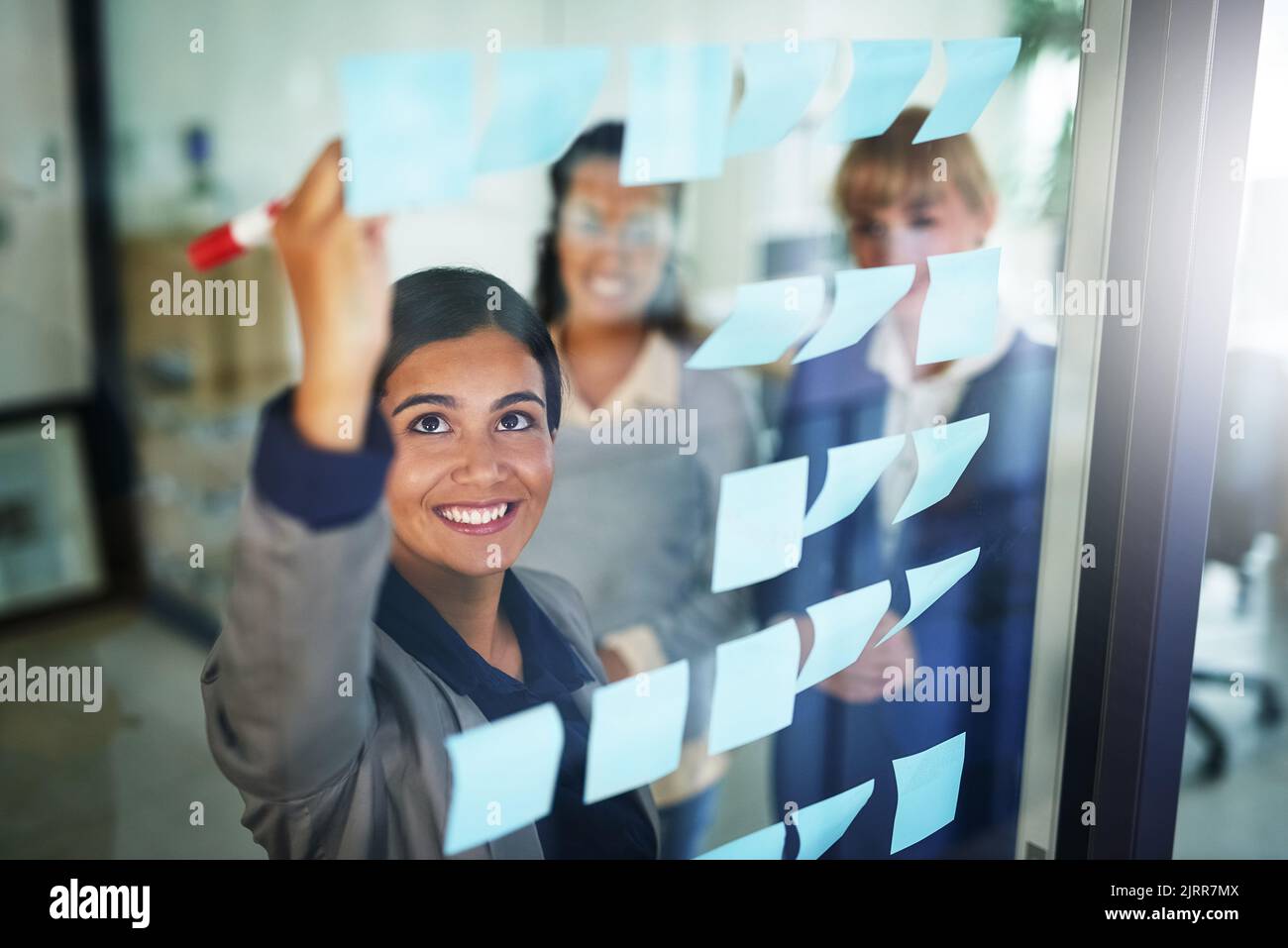 Working hard to realise their ambitious dreams together. a group of ...