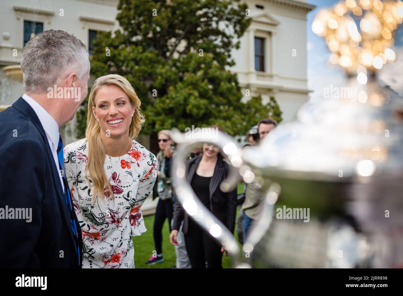 Angelique Kerber with Craig Tiley during a trophy presentation after ...