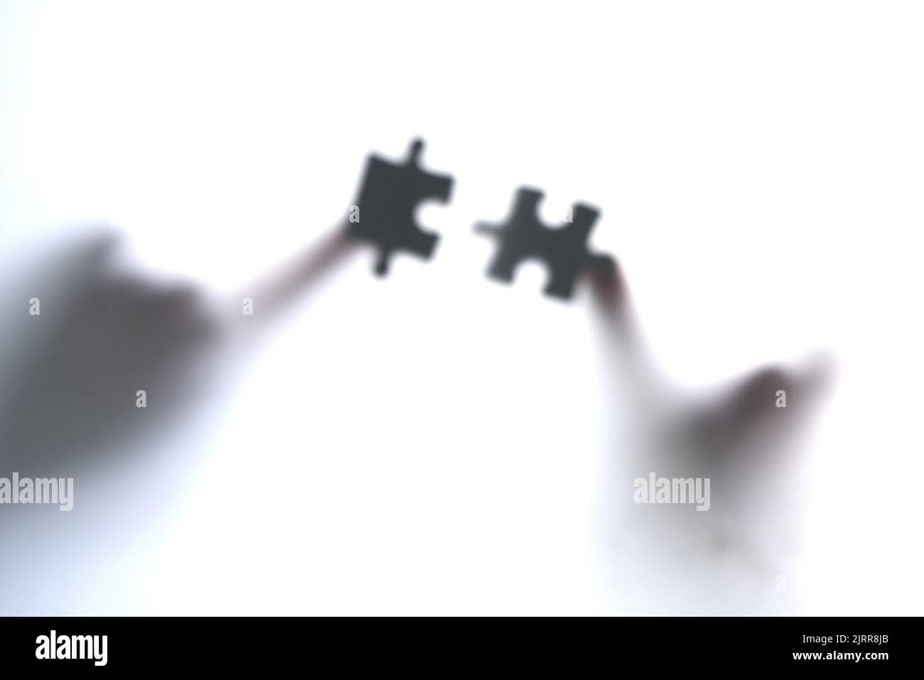 Two pieces coming together hi-res stock photography and images - Alamy