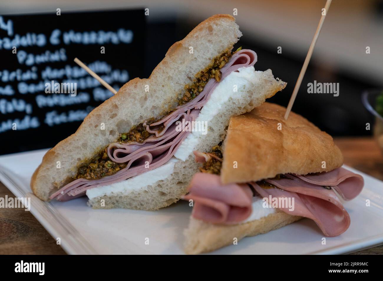 New Yokr, NY - August 25, 2022: Mortadella with mozzarella panini by ...