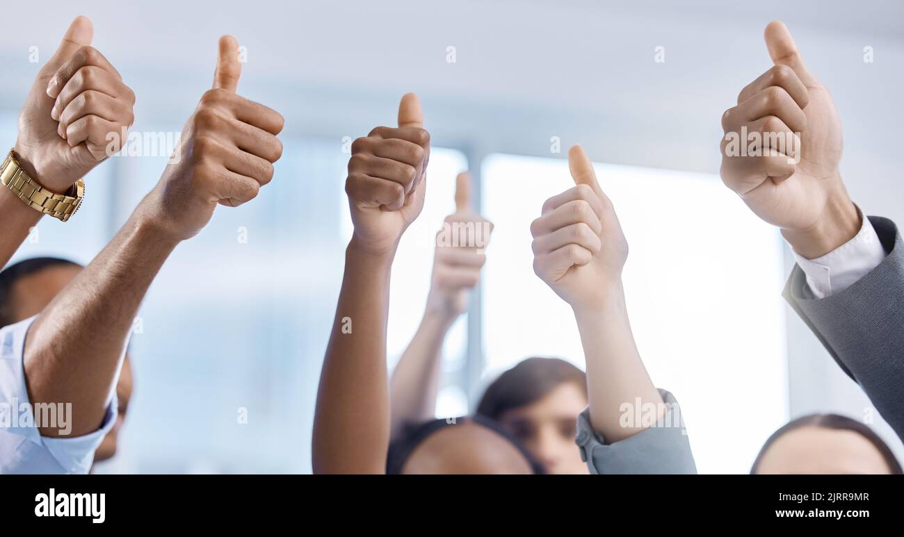 Diversity, hands and thumbs up of business people together in success, support and goal in ...