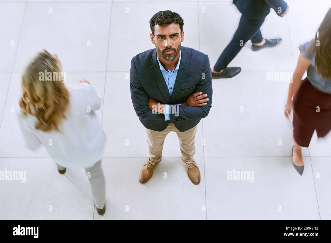 Work hard until you stand out from the crowd. Portrait of a businessman ...