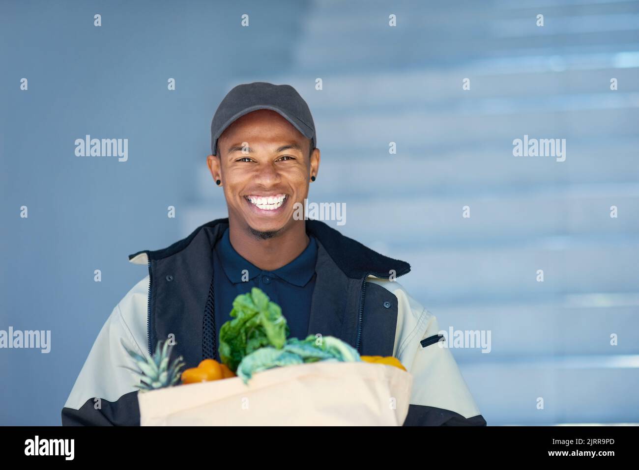 Well bring the grocery store to you. Portrait of a courier making a ...
