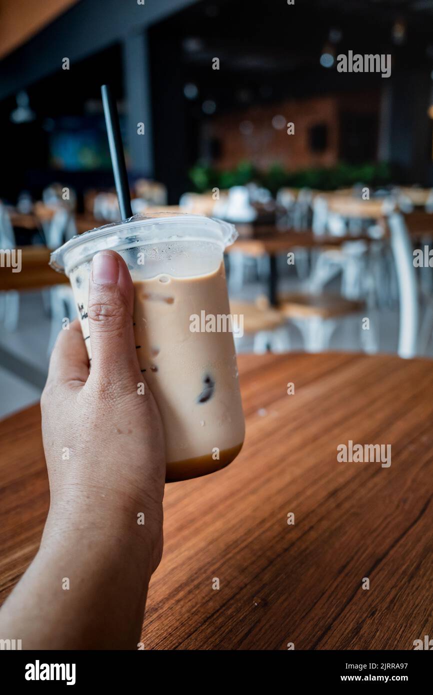 Hand serving drinks hi-res stock photography and images - Alamy
