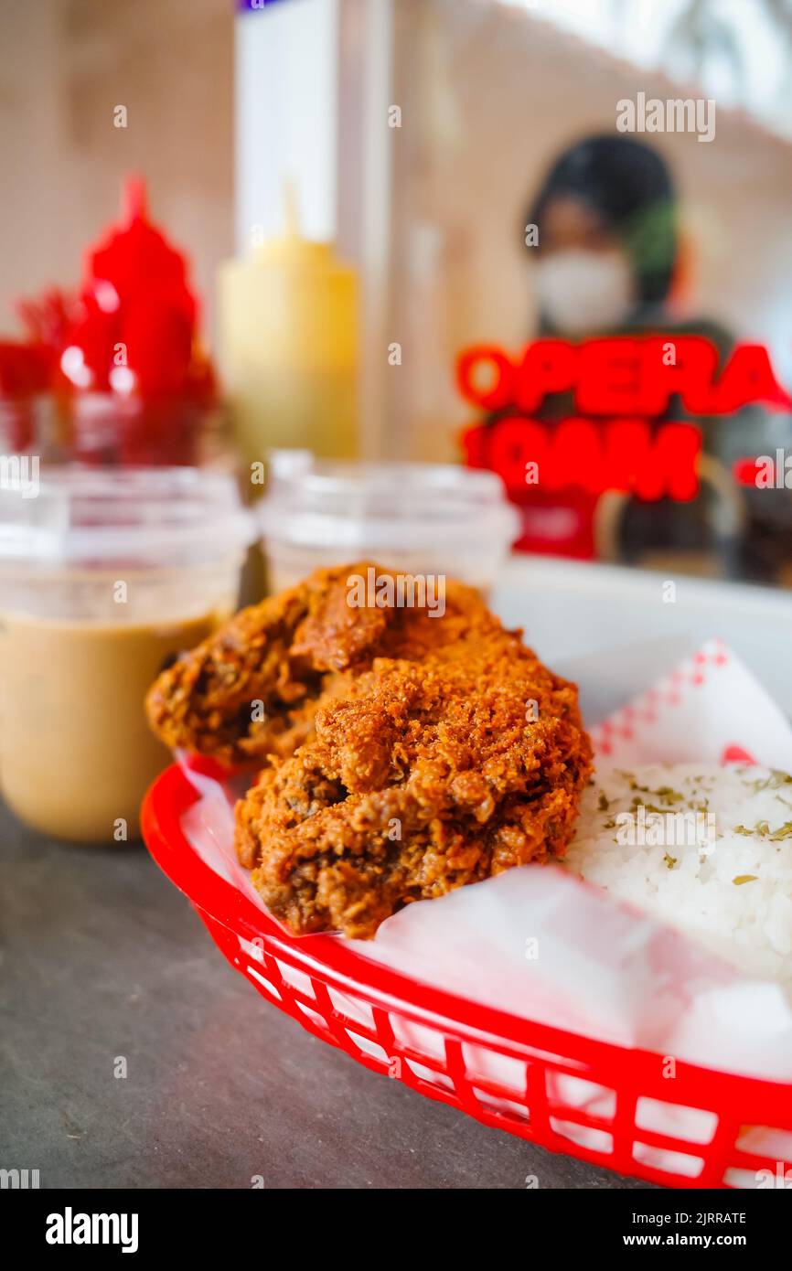 Asian fast food meal menu of spicy fried chicken with rice and coffee ...