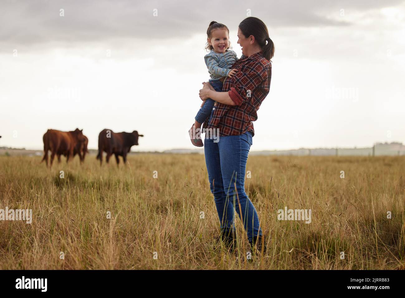 Sustainability, agriculture and countryside farm mother and daughter ...