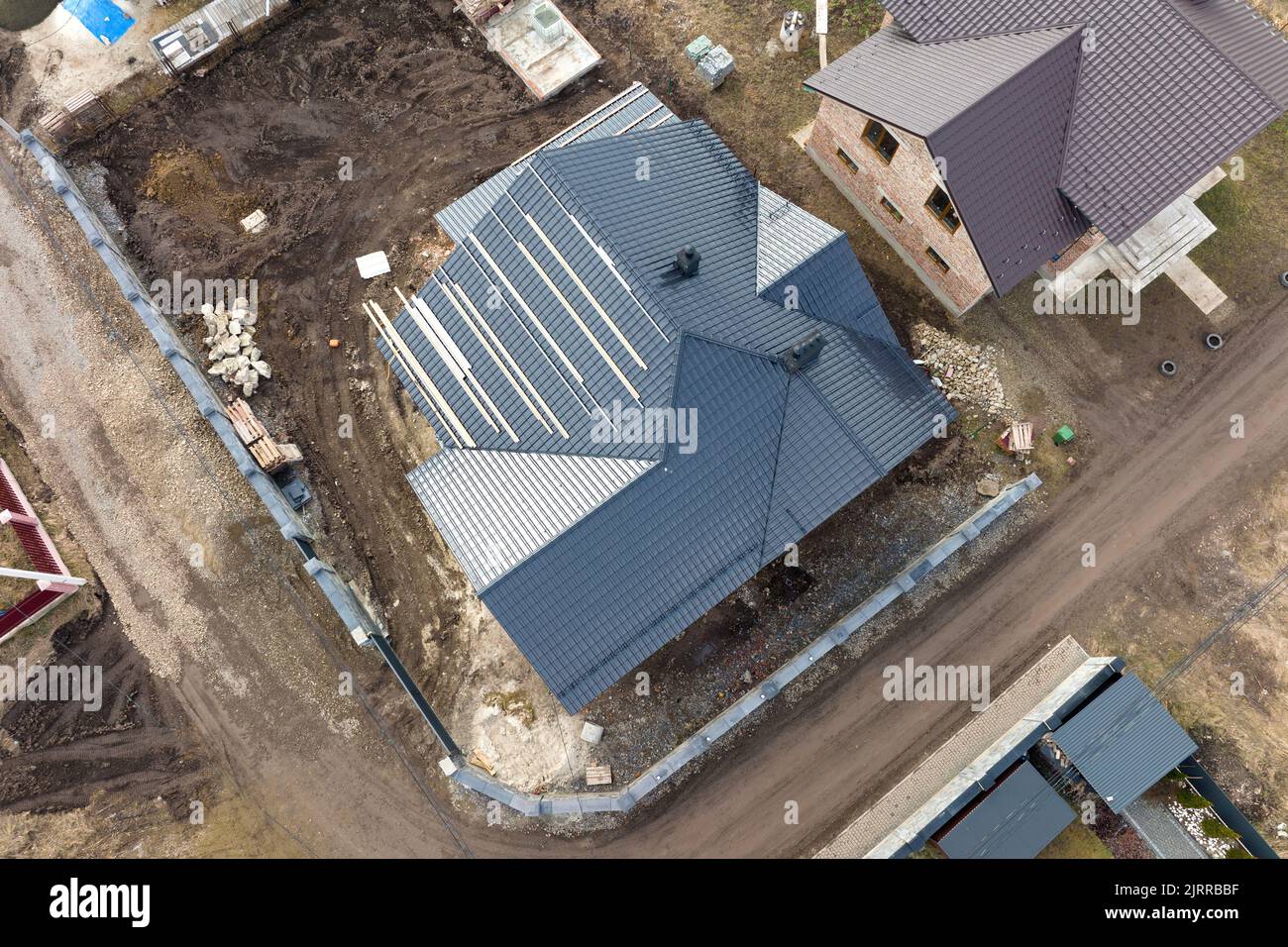 Aerial view of residential house with backyard in suburban rural area ...