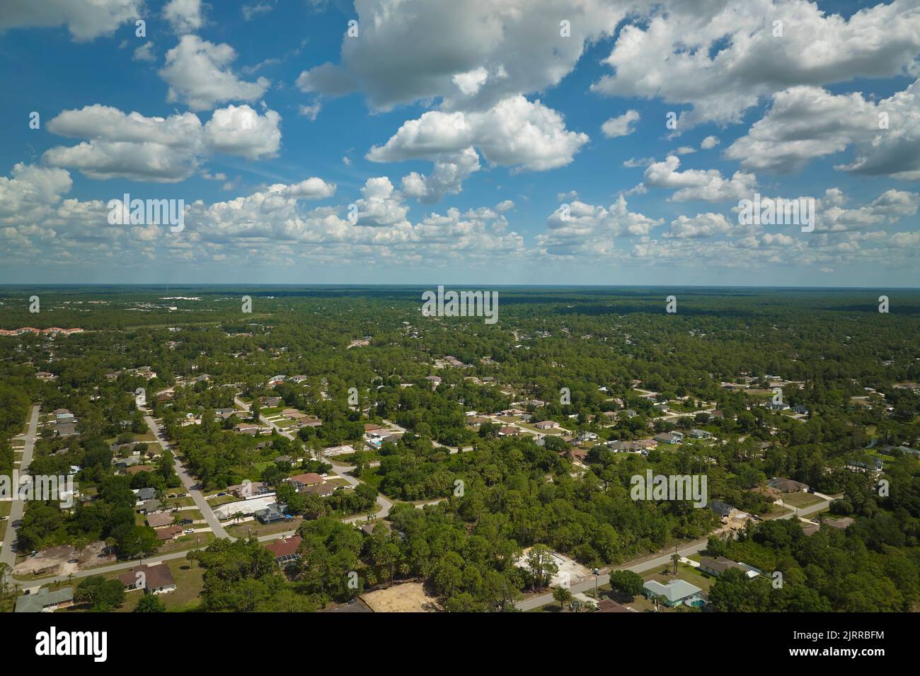 Aerial view of small town America suburban landscape with private homes ...