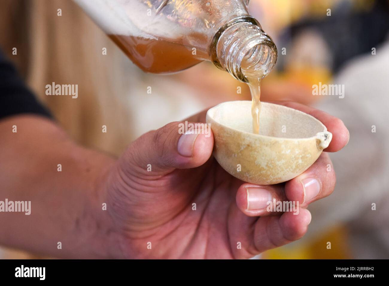 Drinking flavoured Mezcal, Oaxaca Mexico Stock Photo - Alamy