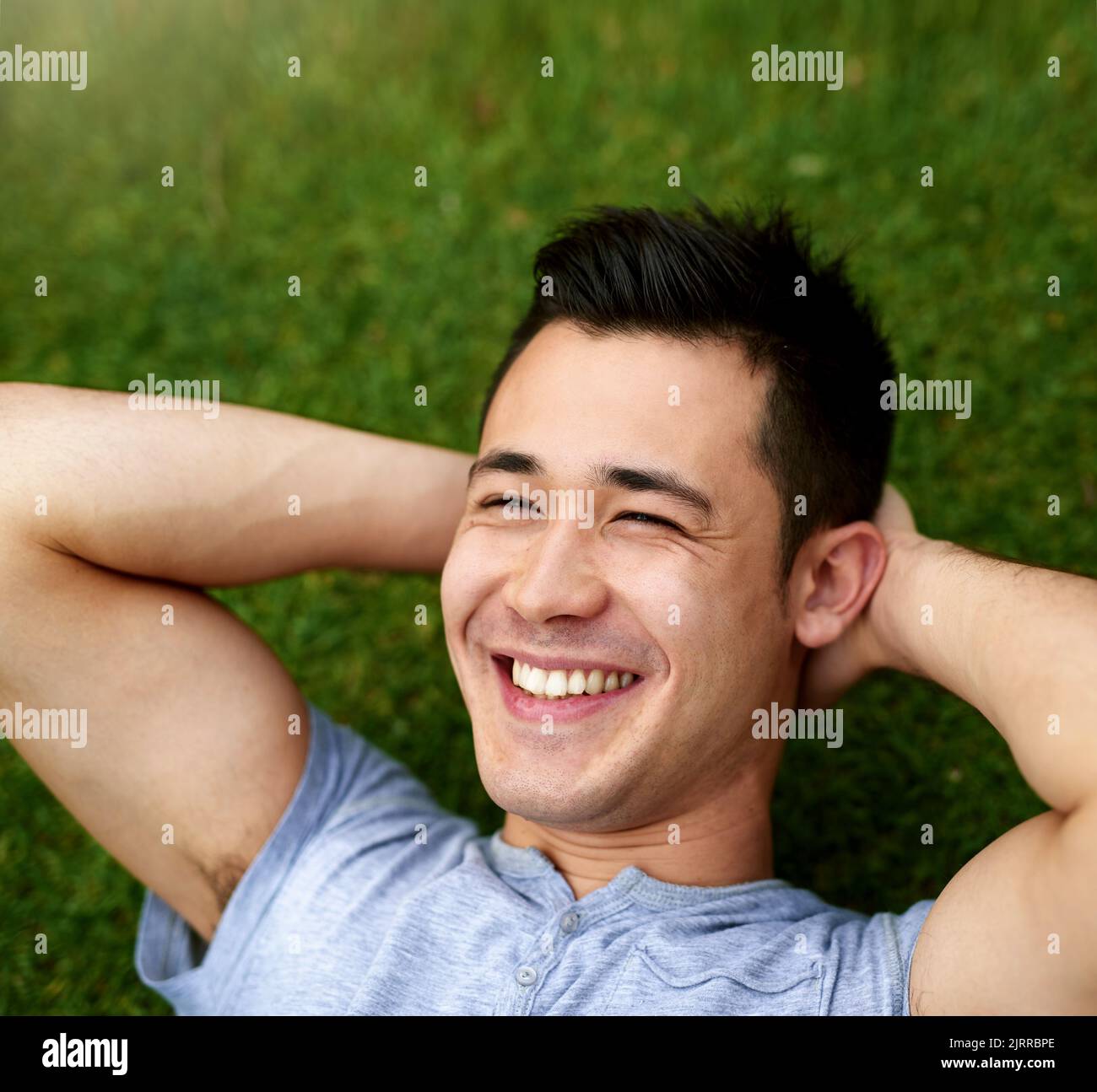Time to chill out and enjoy the weekend. a handsome young man relaxing ...