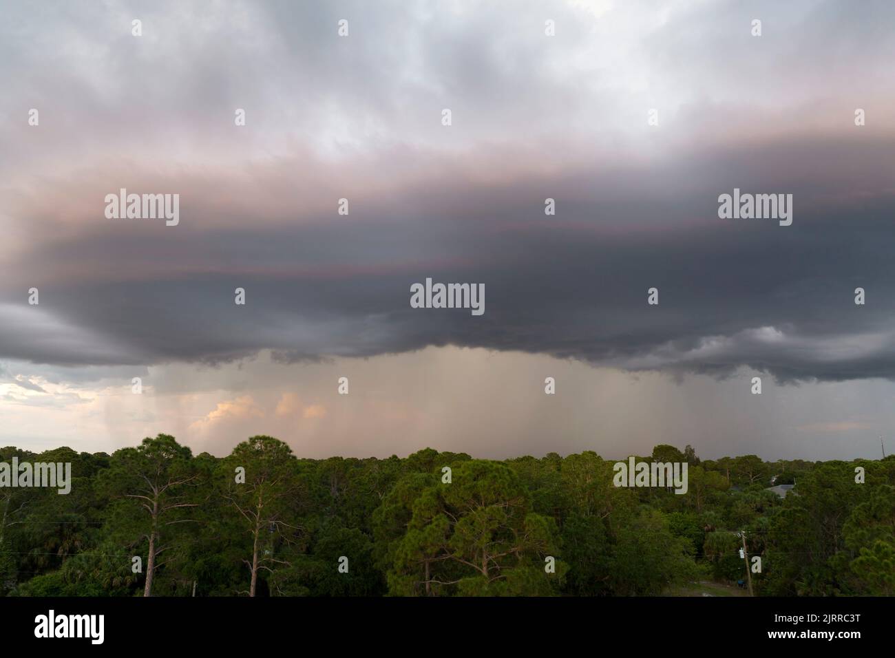 Dark stormy clouds forming on gloomy sky before heavy rainfall over ...
