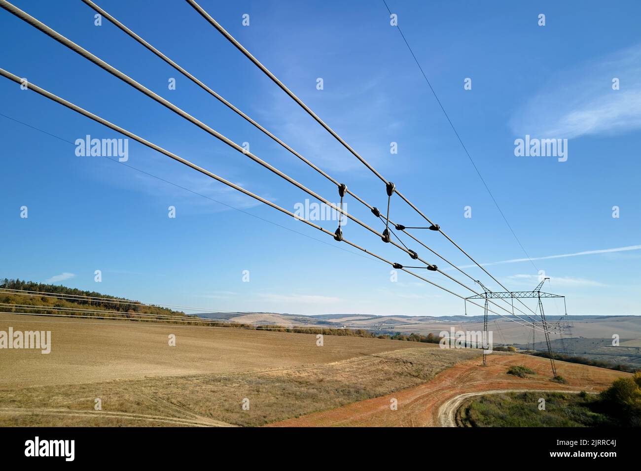 Electric power lines divided by safe guard insulating frame transfening ...