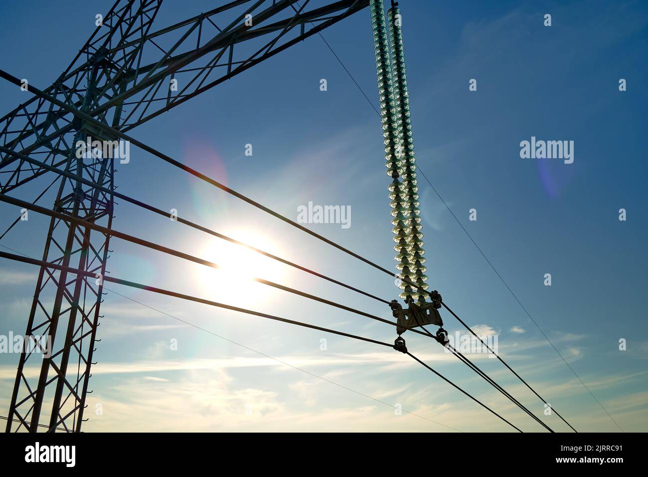High voltage tower with electric power lines transfening electrical ...