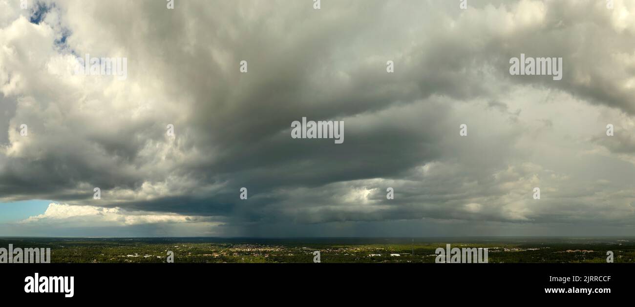 Landscape of dark ominous clouds forming on stormy sky before heavy ...