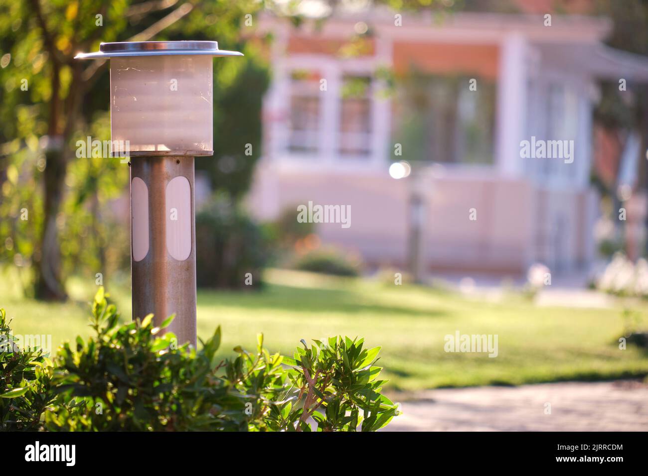 Outdoor lamp on yard lawn for garden lighting in summer park Stock ...