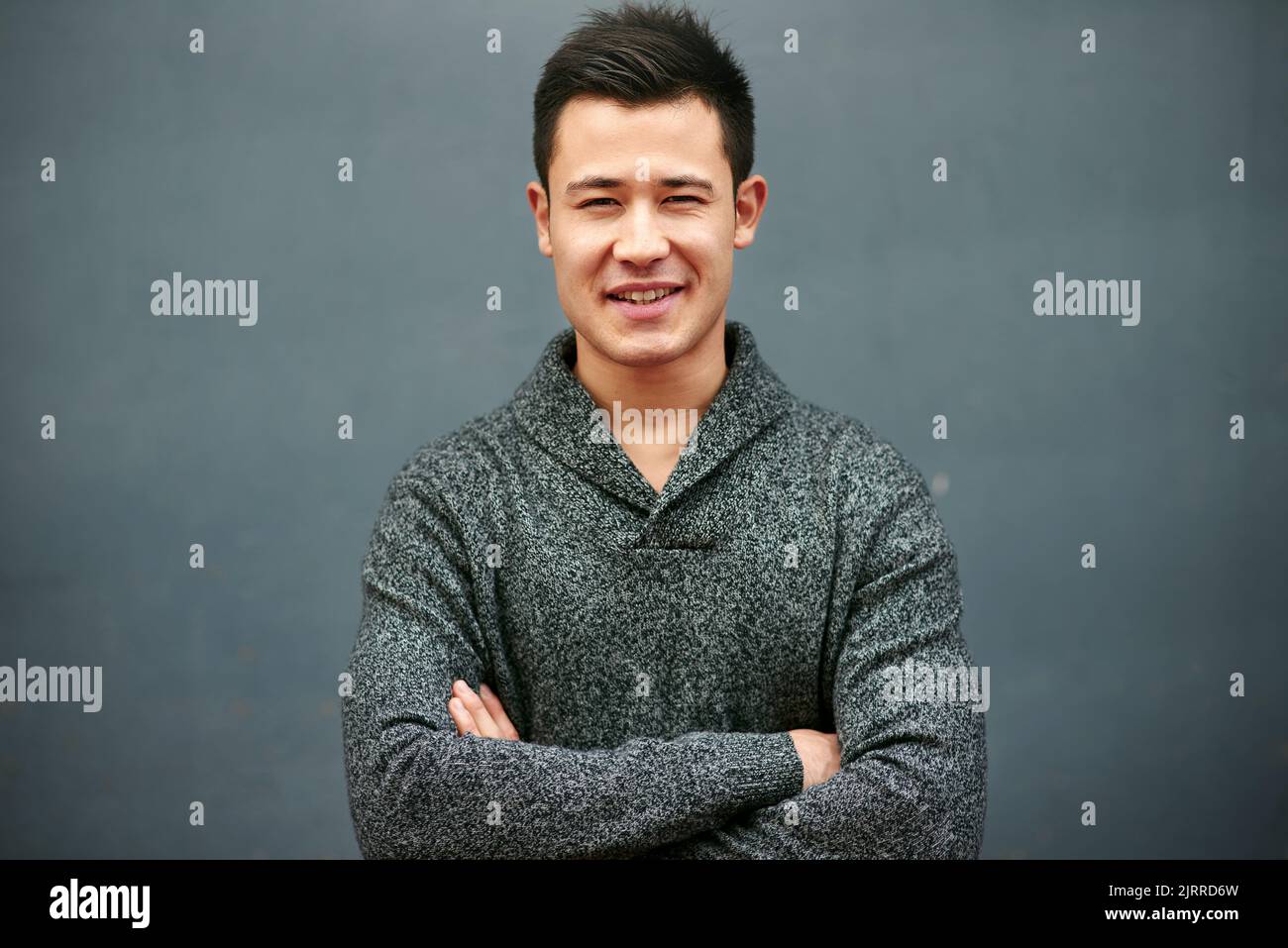 Hes a cool and casual guy. Studio portrait of a handsome young man ...