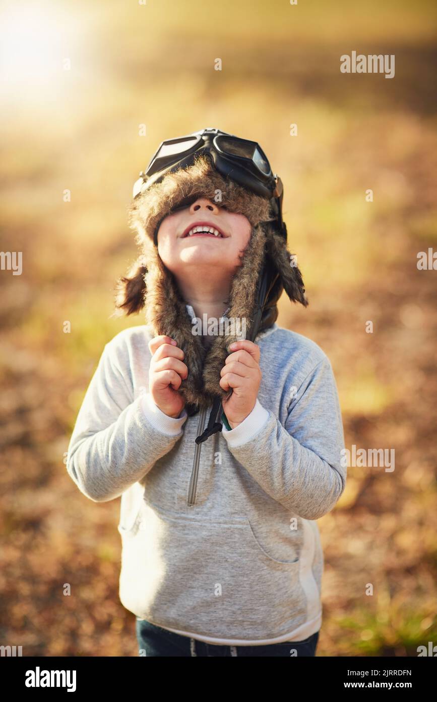 Never let go of your dreams. a cute little boy wearing a pilots hat and ...