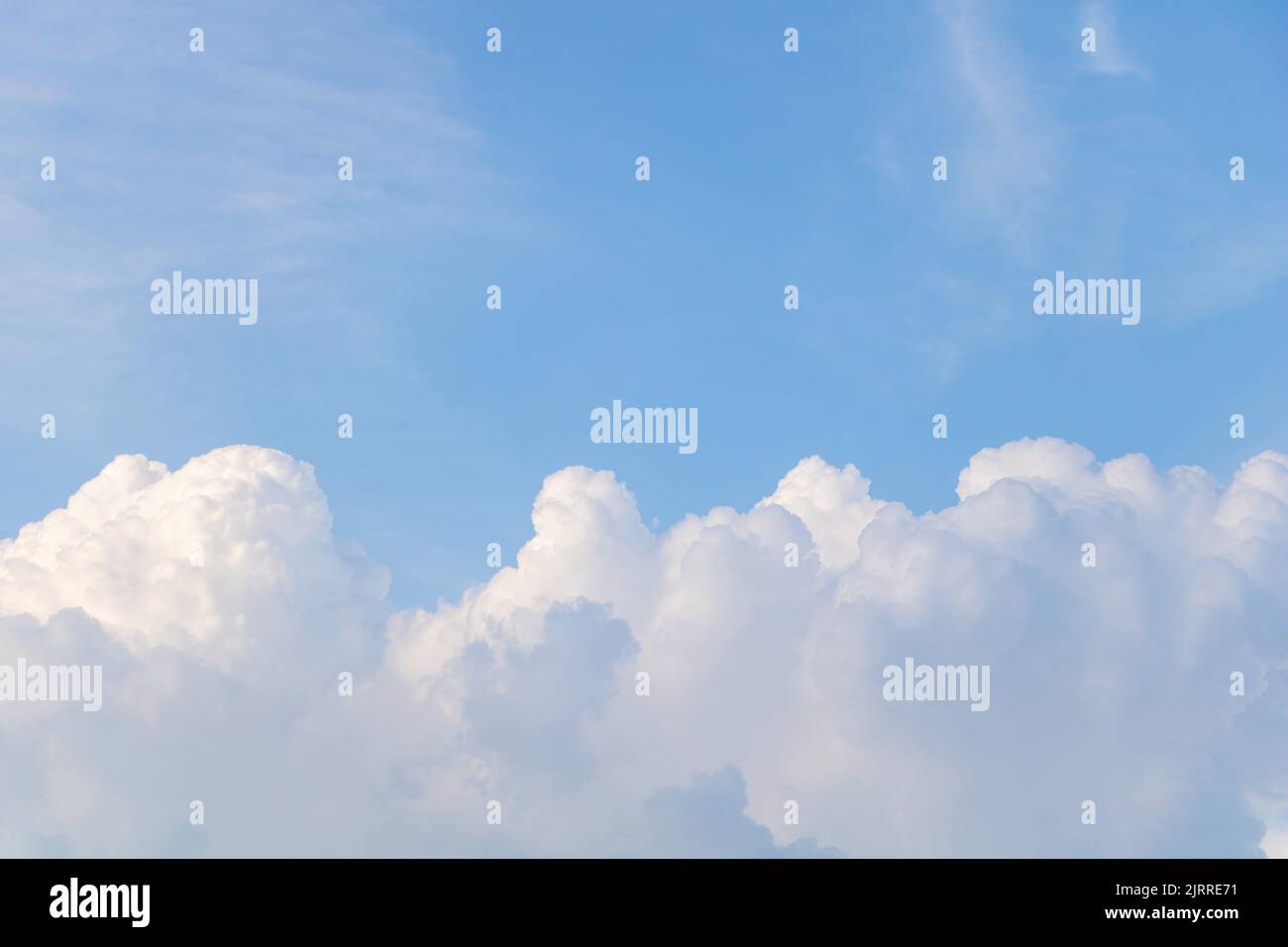 Fluffy clouds in blue sky - From below of fluffy white clouds floating ...