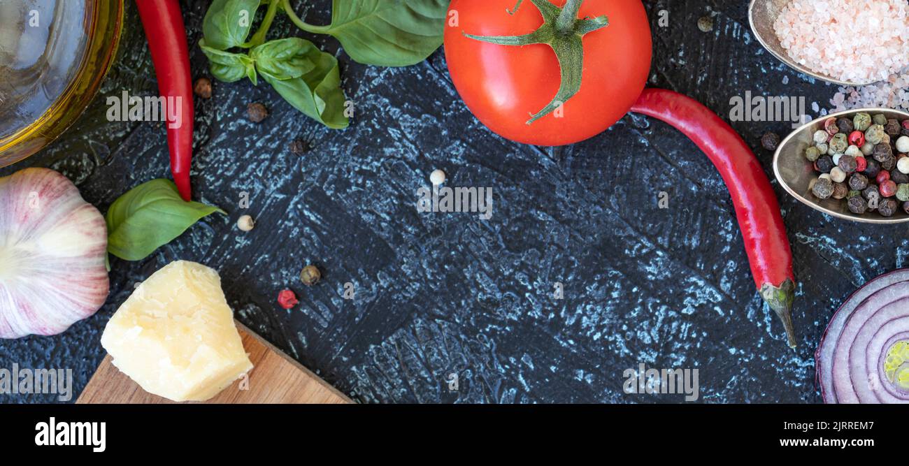 banner with Italian cheese parmesan with tomato, chili and basil. black ...