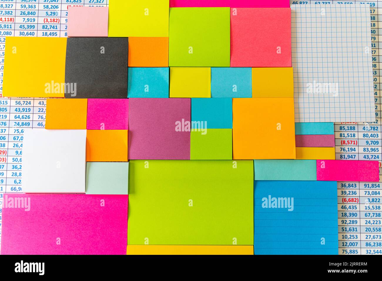 pile of sticky notes on office table at work Stock Photo - Alamy