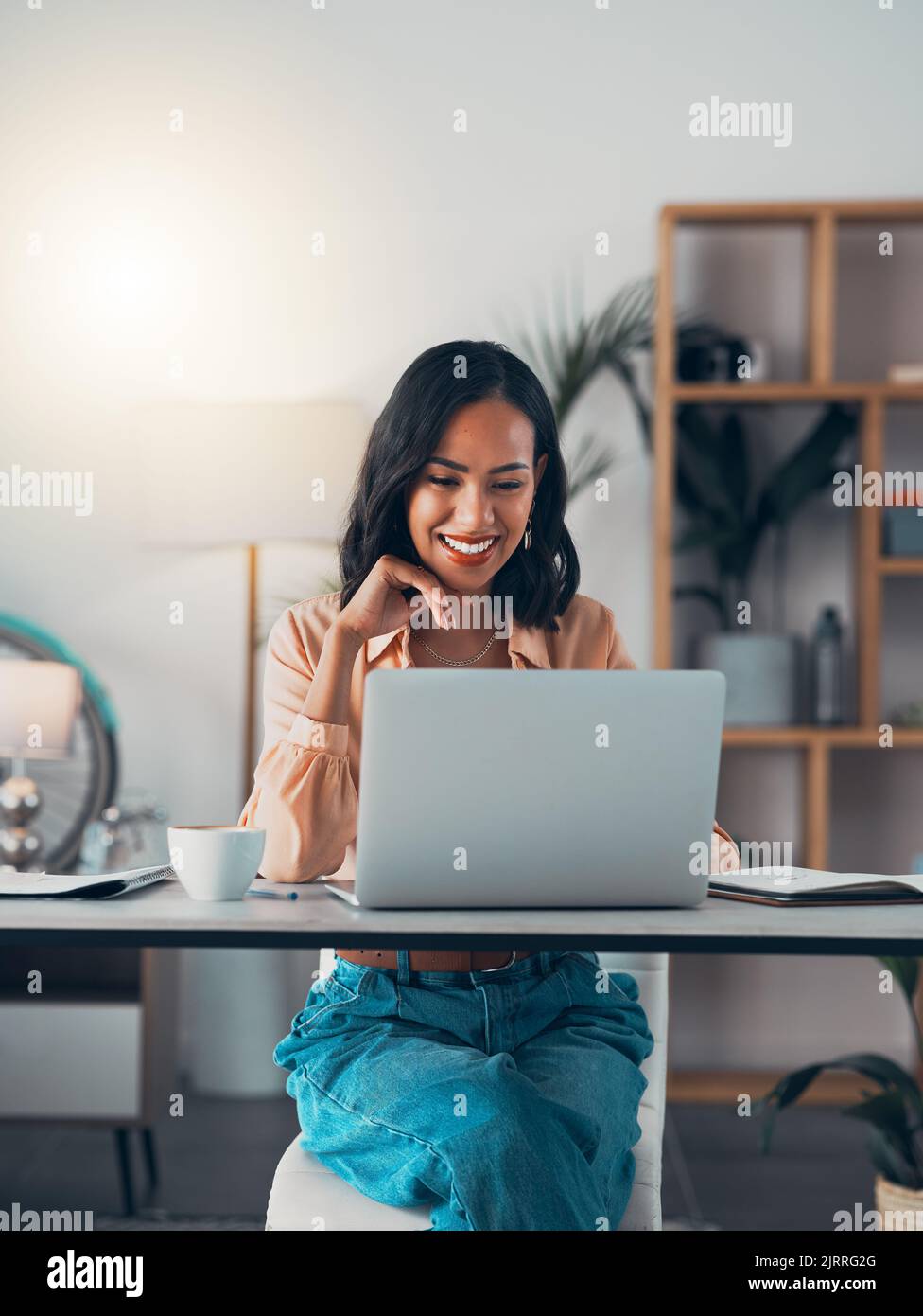 Working from home on laptop, freelance blogger and entrepreneur thinking, planning and reading ...