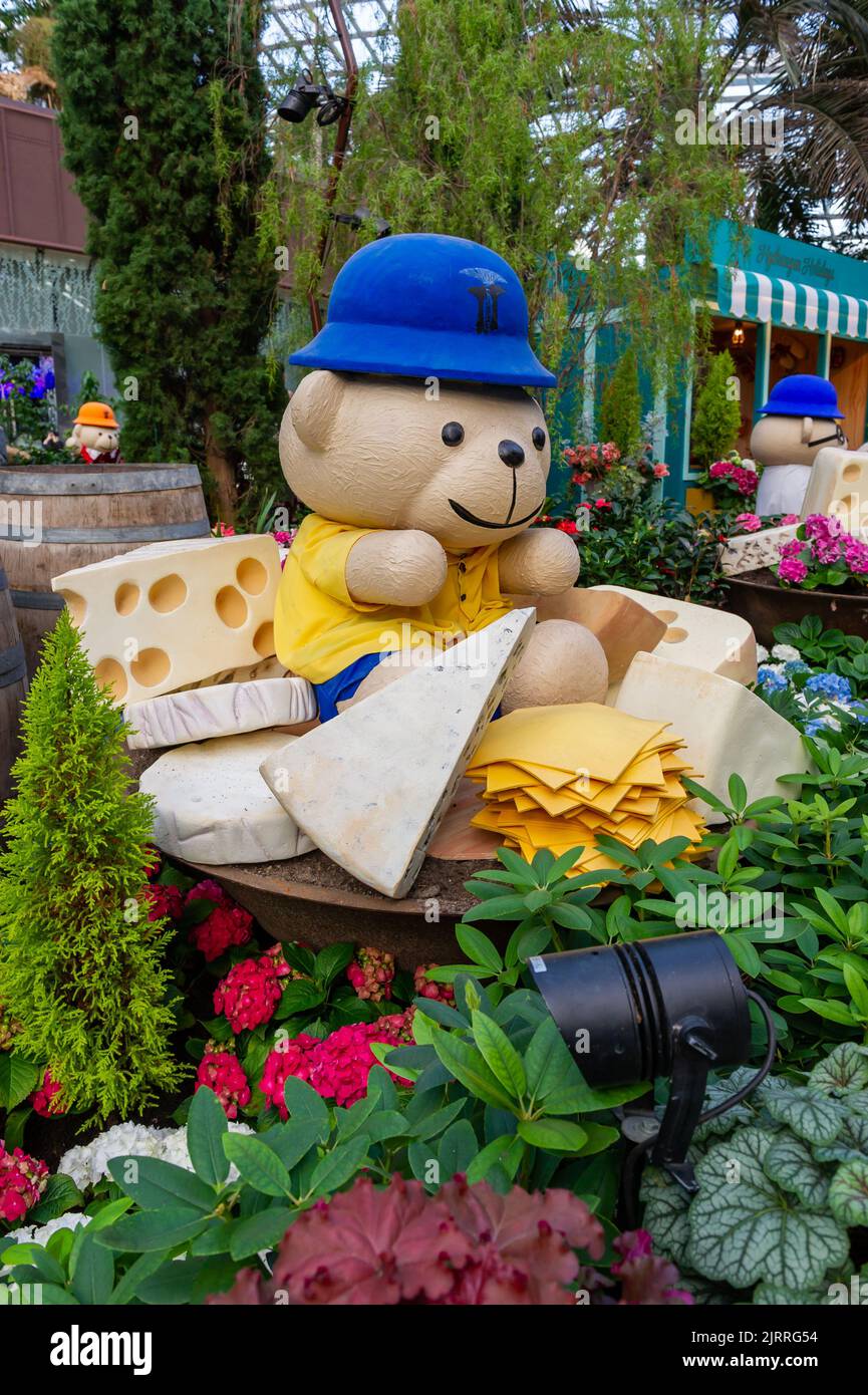 A cuddly Teddy bear with cheese at the Dutch Section in the Flower Dome ...