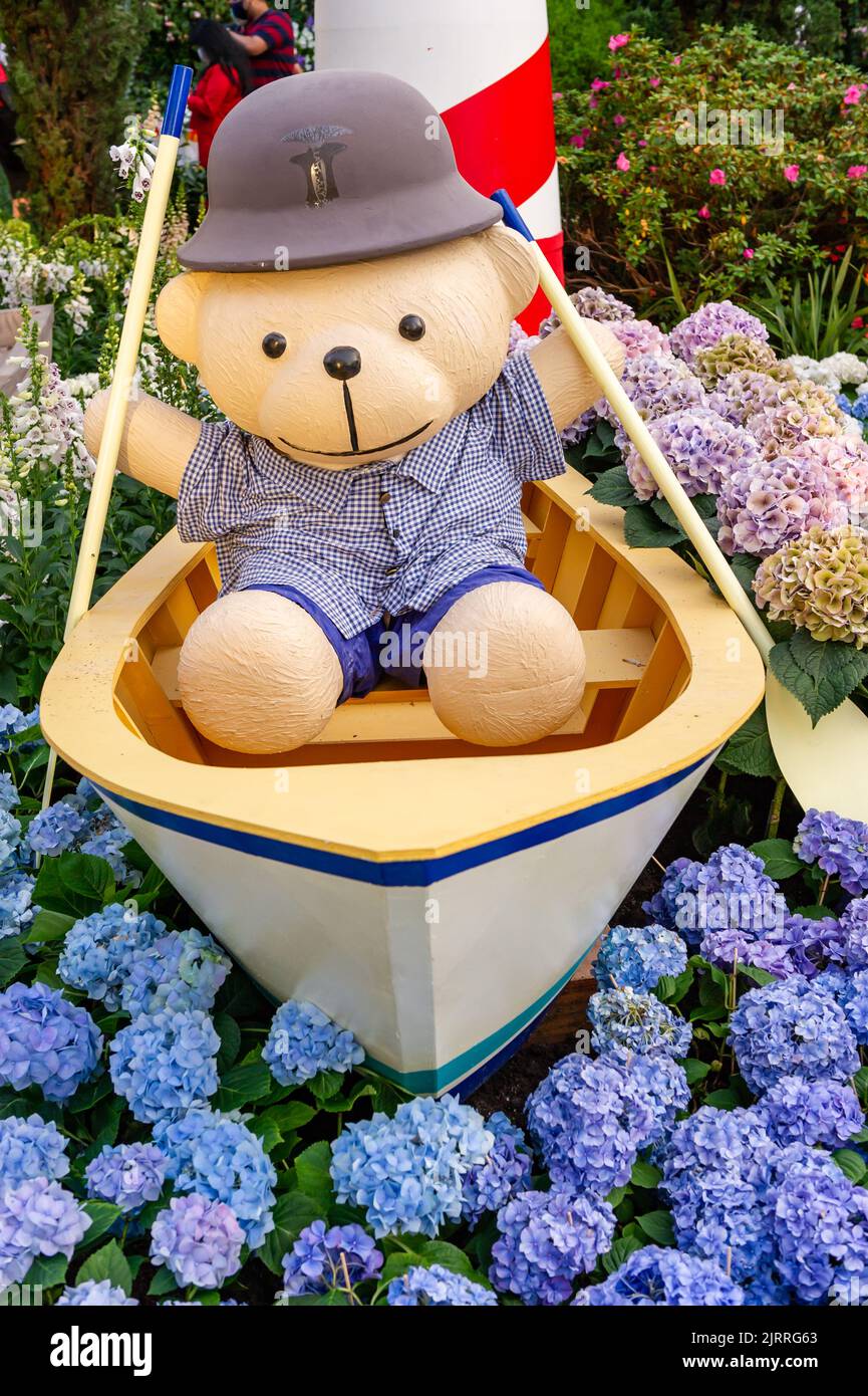 A cuddly Teddy bear with a boat in the Dutch Section at the Flower Dome ...