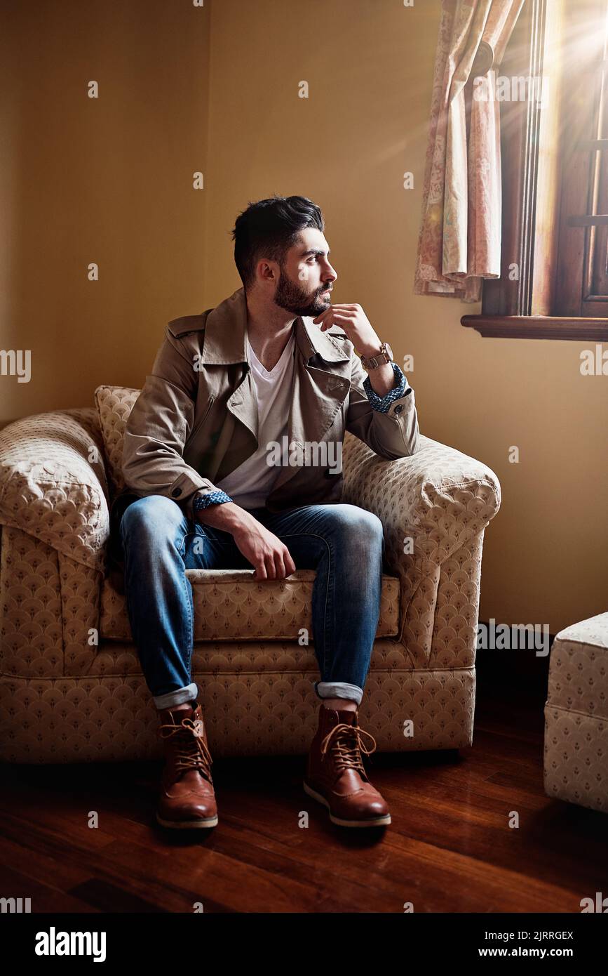 Person sitting in chair at home hi-res stock photography and images - Alamy
