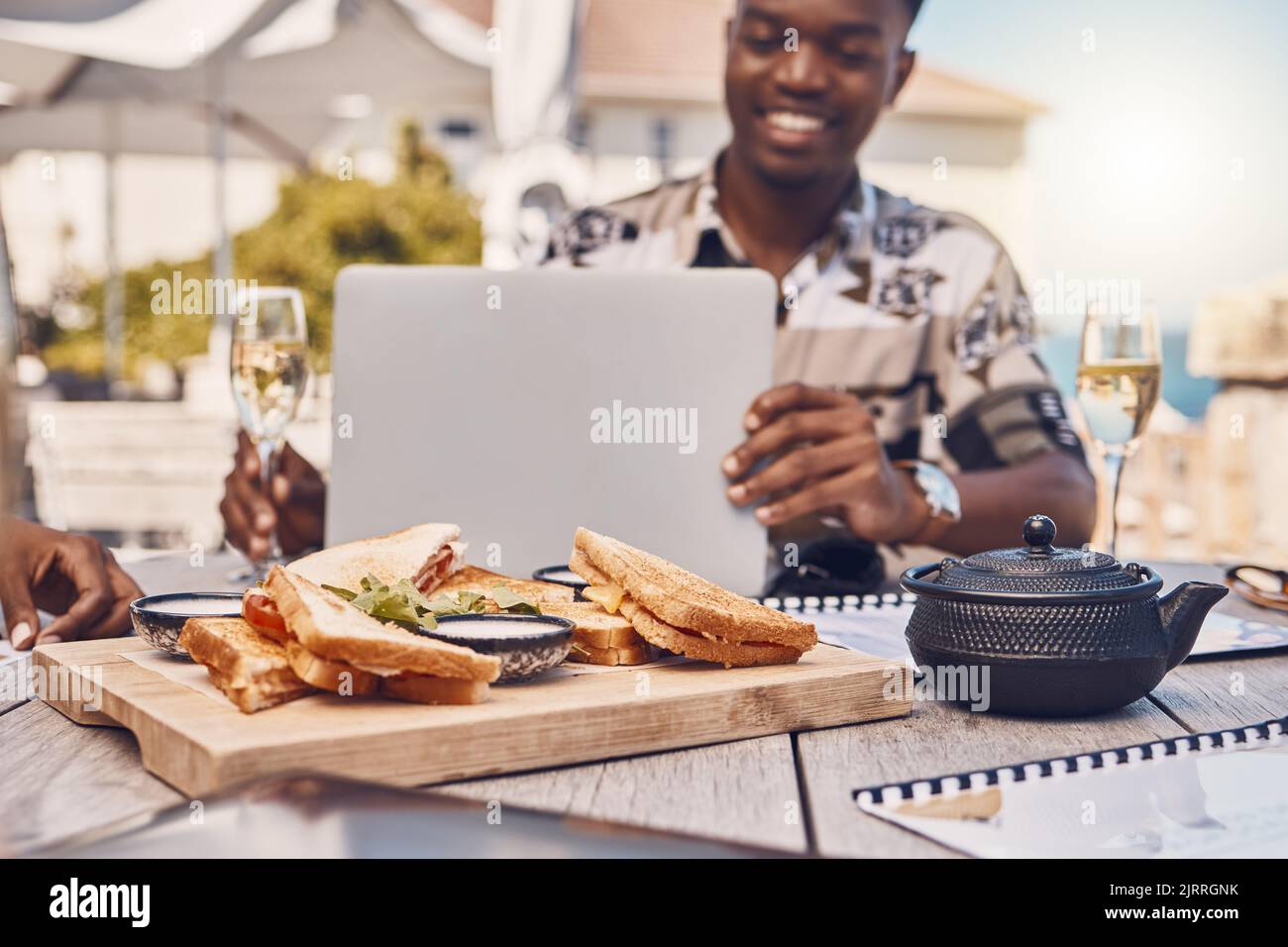 Man eating and working with laptop hi-res stock photography and images ...