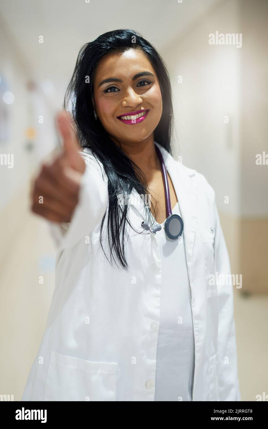 Your health status is looking positive. Portrait of a doctor showing ...