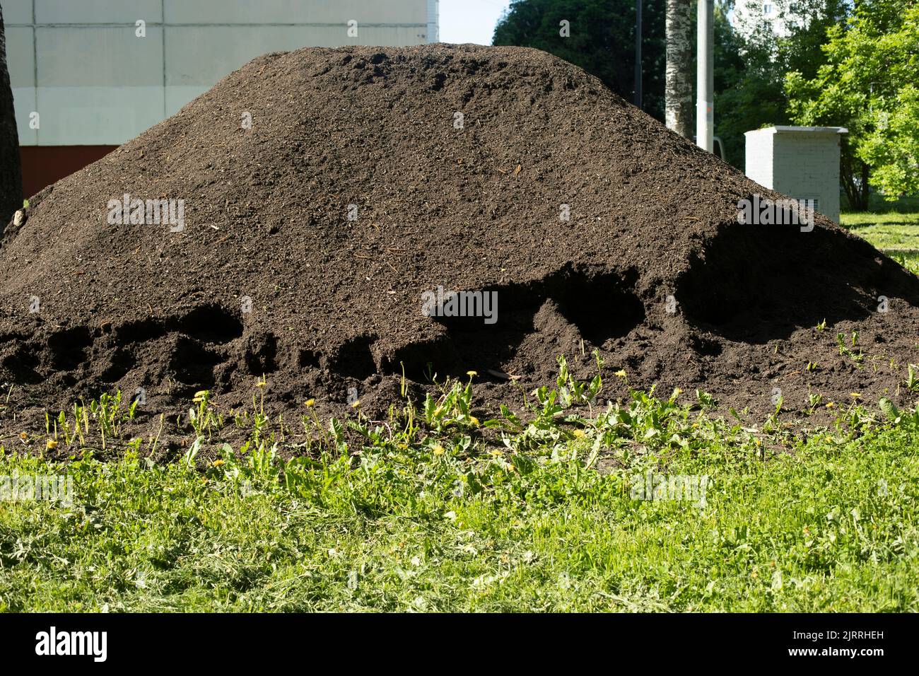 Pile of earth. Soil for garden. Soil for planting plants. Slide of ...
