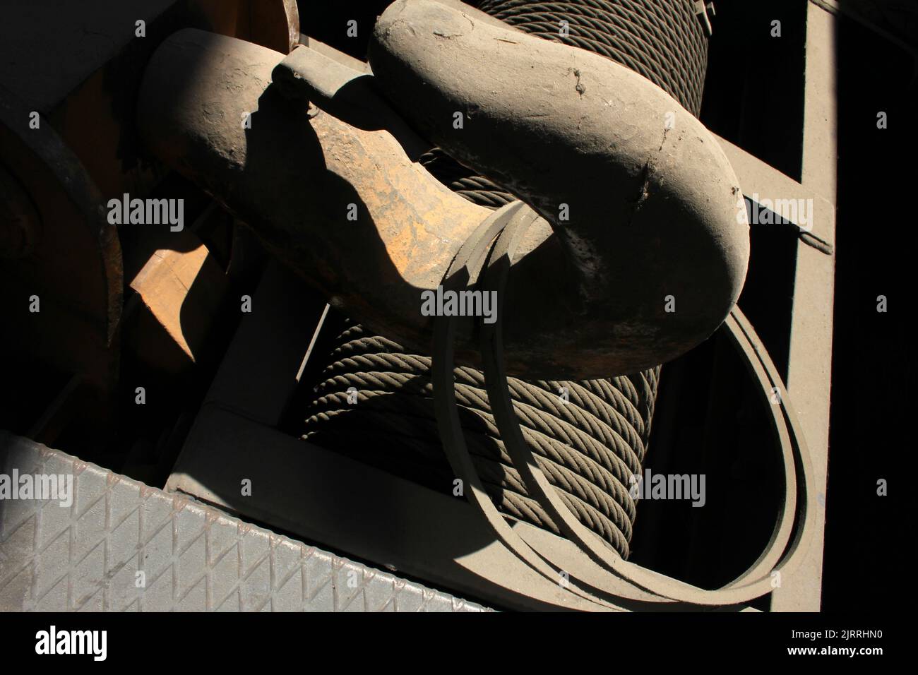 big crane hook inside factory Stock Photo - Alamy