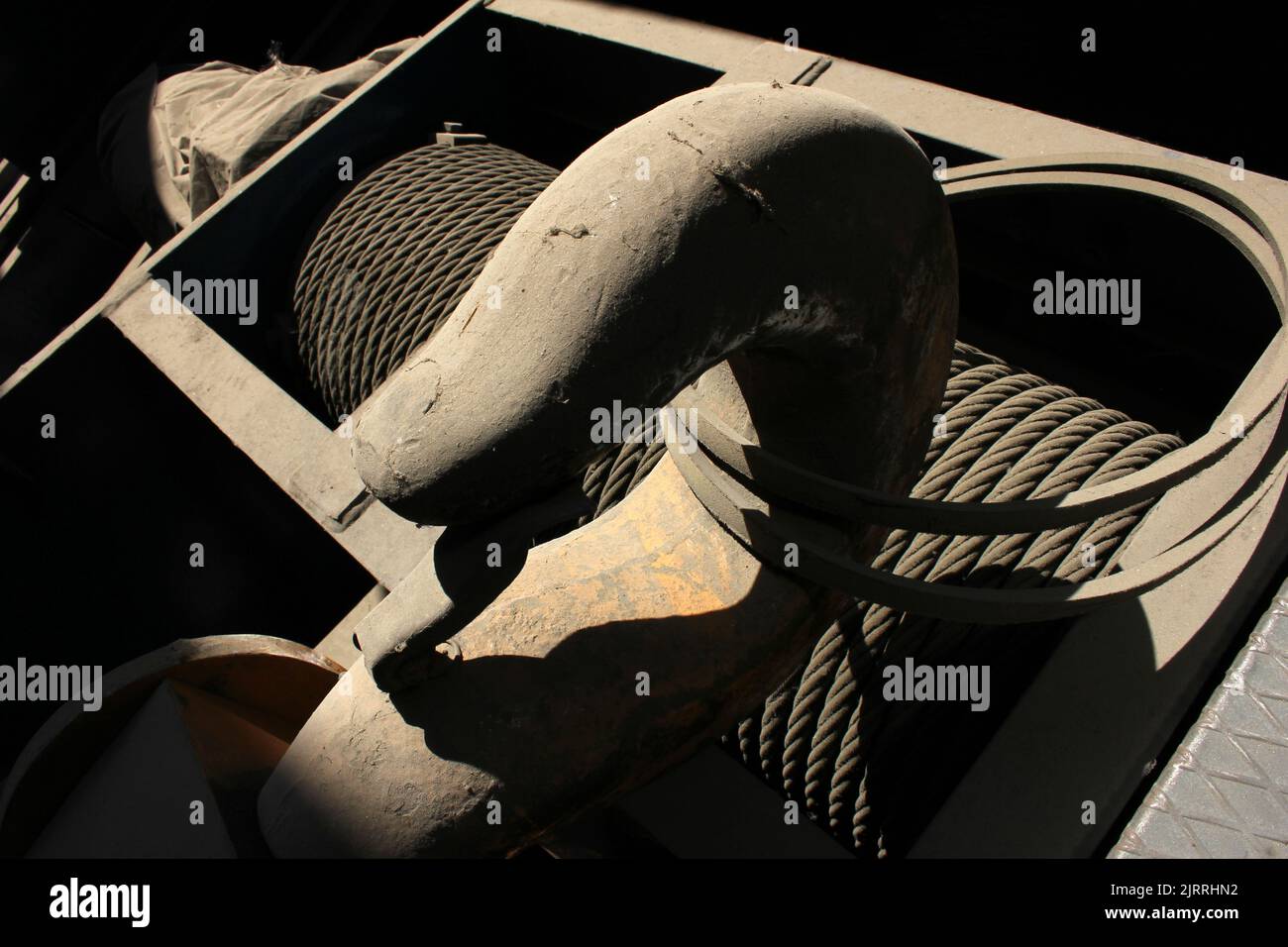big crane hook inside factory Stock Photo - Alamy