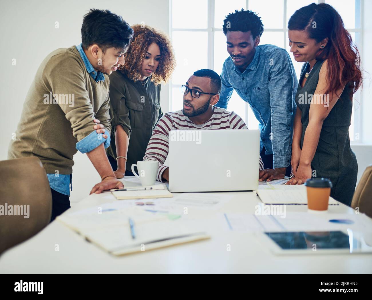 Putting their collaborative skills to good use. a group of colleagues ...